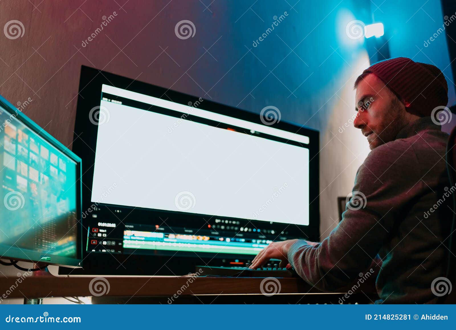 Male Video Editor Working on His Personal Computer with Big Blank ...