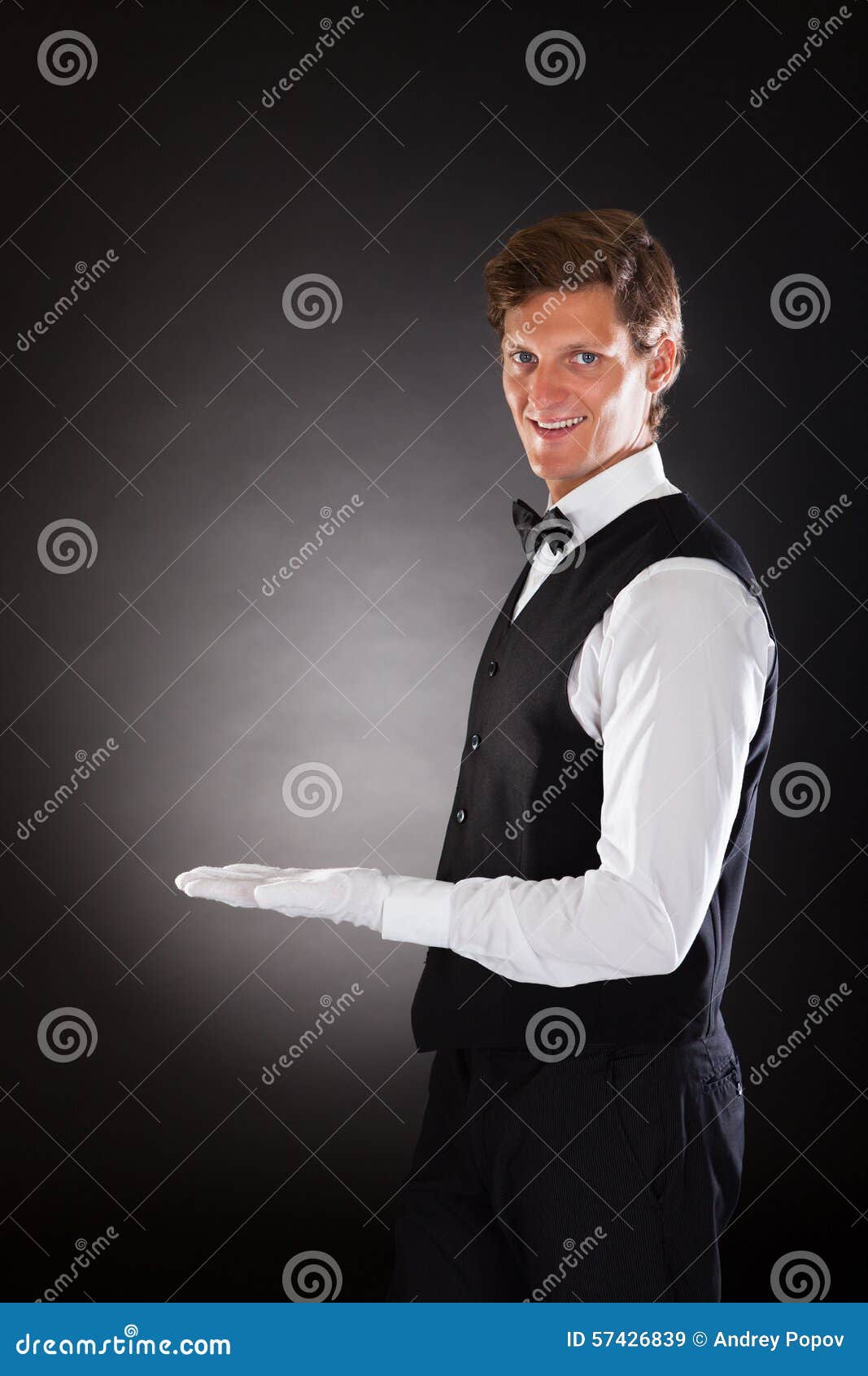 Male Waiter Presenting Something Stock Image - Image of catering ...