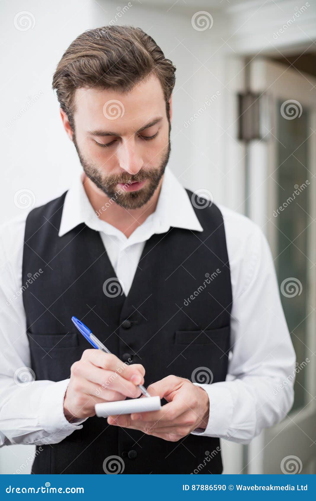 Male Waiter Taking Down Order Stock Photo - Image of drink, confidence ...