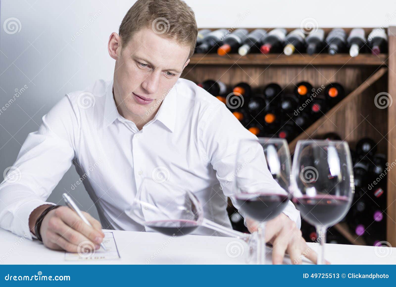 Male Winemaker Examining a Wine Glass Stock Image - Image of restaurant ...