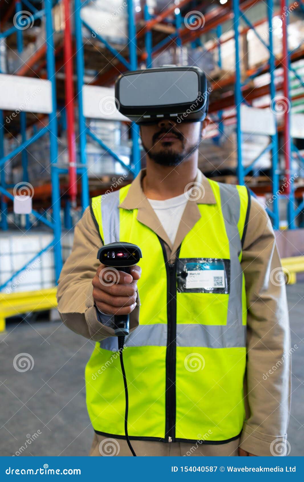 Male Worker with Barcode Scanner Using Virtual Reality Headset in ...