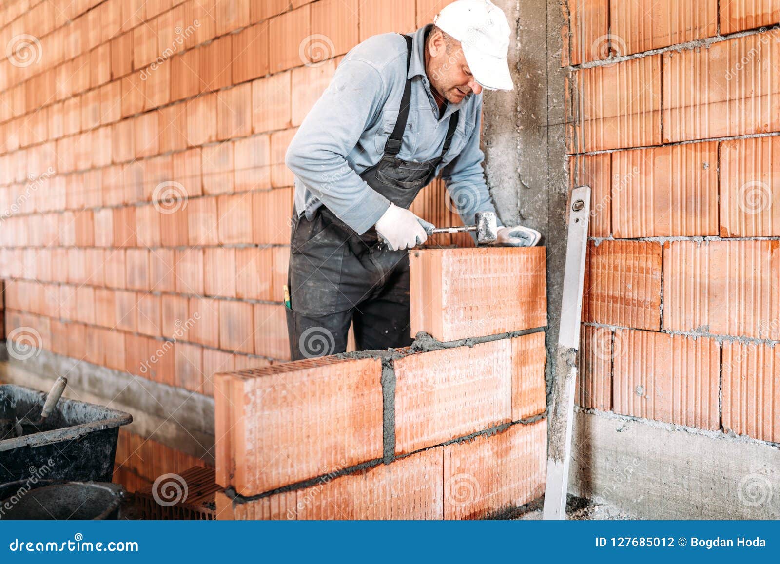 Male Worker, Bricklayer. Professional Worker Building House Stock Photo ...
