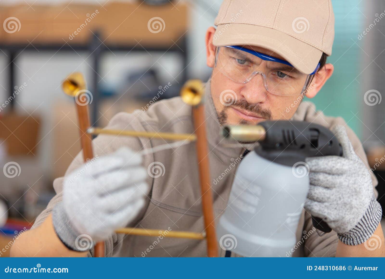Male Worker Building Metal Frame with Welder Stock Photo - Image of ...