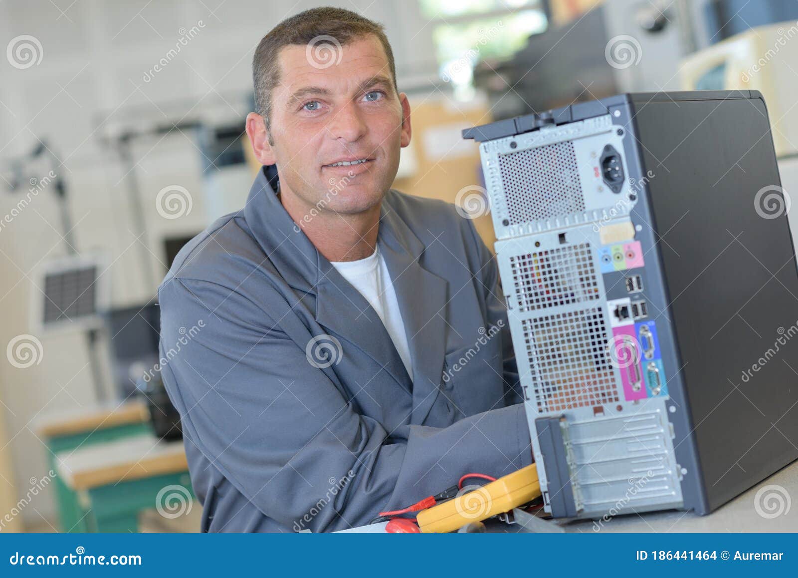Male Worker with Central Processing Unit Stock Photo - Image of program ...