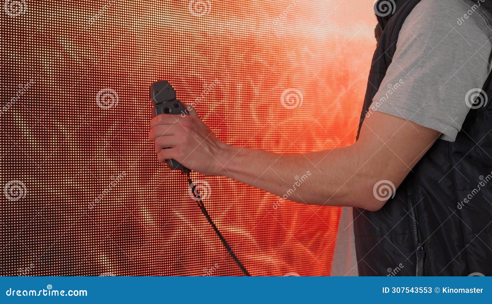 Male Worker Checking Big Led Screen. Technician with Lux Meter Device ...