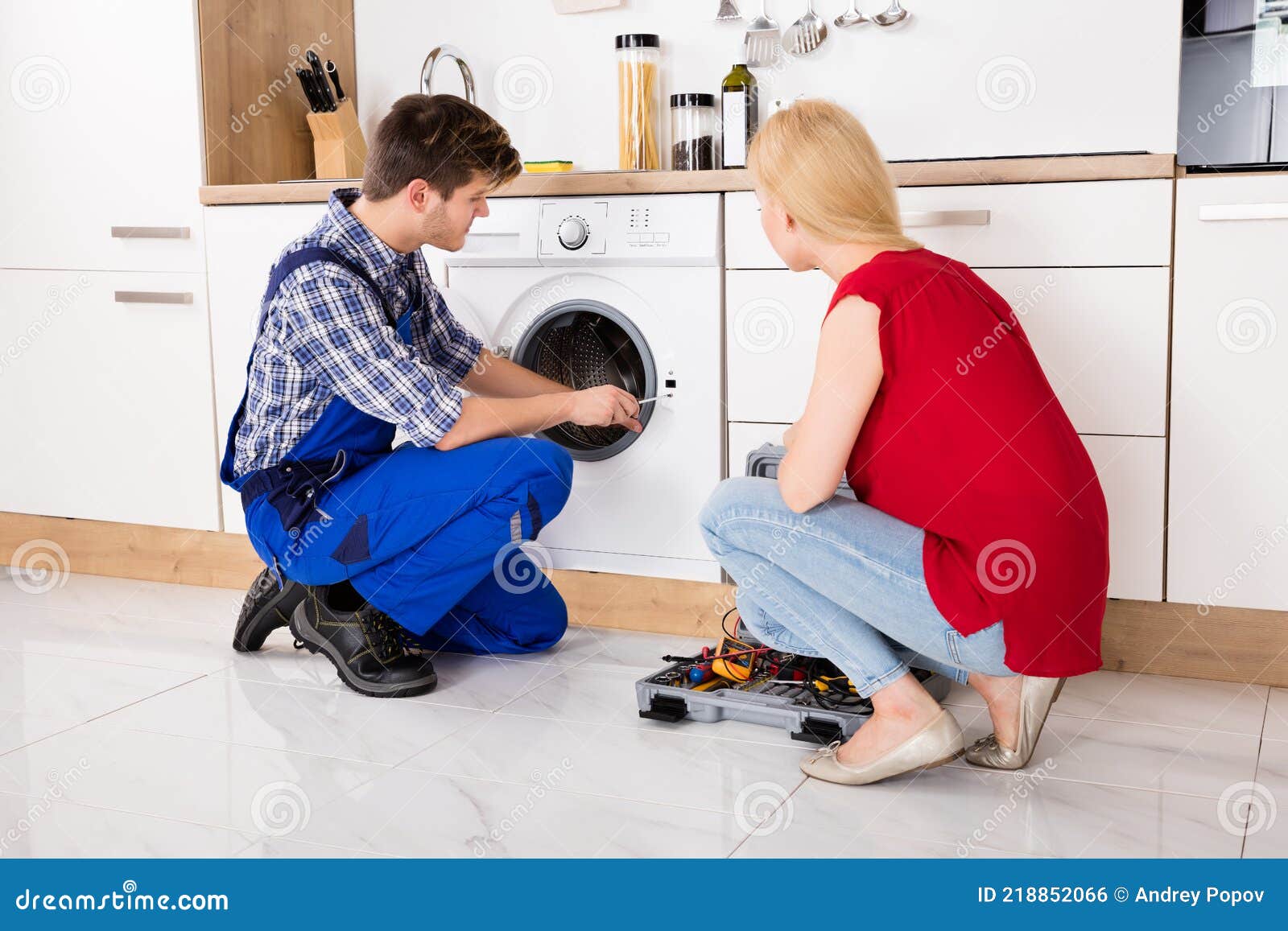 Male Worker Checking the Defects in Washing Machine Stock Photo - Image ...