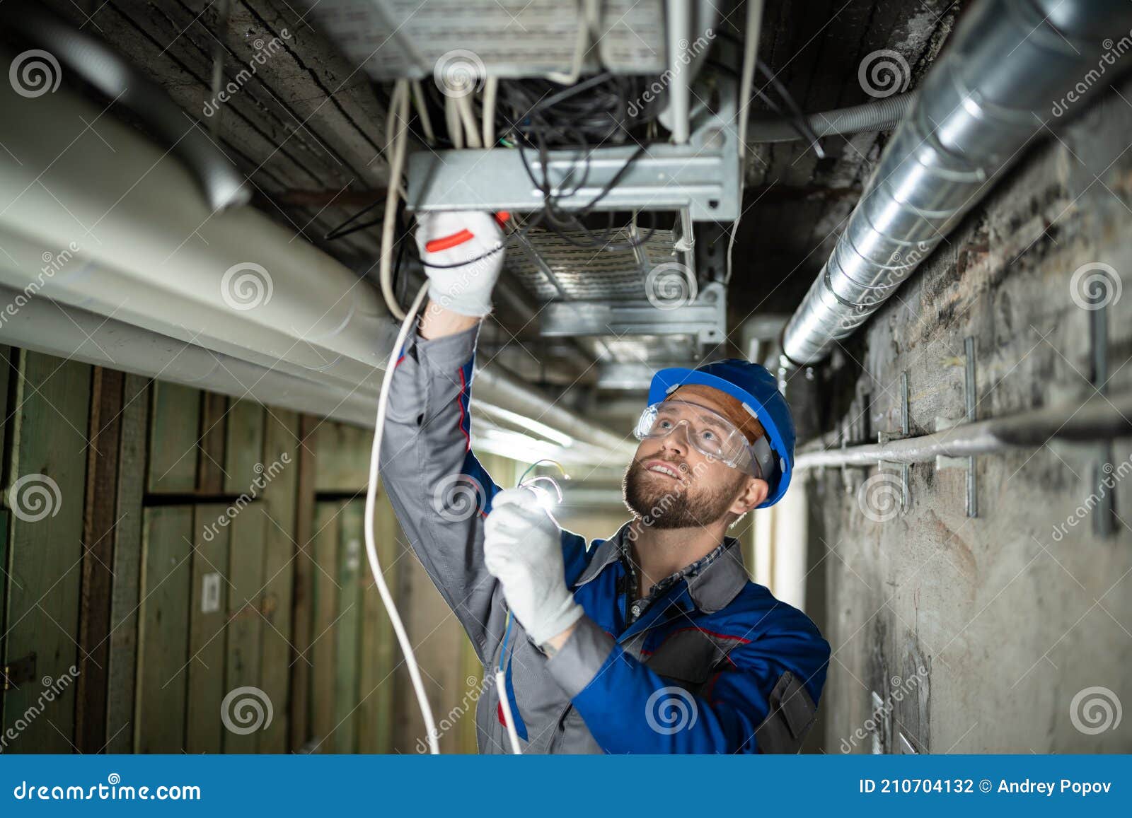 Male Worker Connecting Cables Stock Photo - Image of cable, hard: 210704132