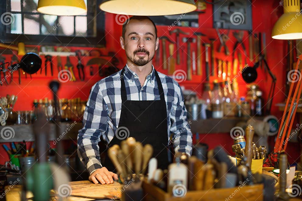 Male Worker Demonstrating Workplace and Tools in Leather Stock Image ...