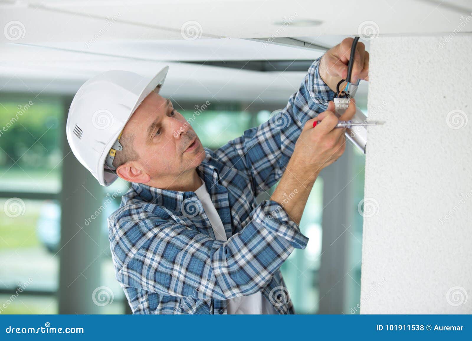 Male Worker Doing Maintenance Work on Security Camera Stock Photo ...