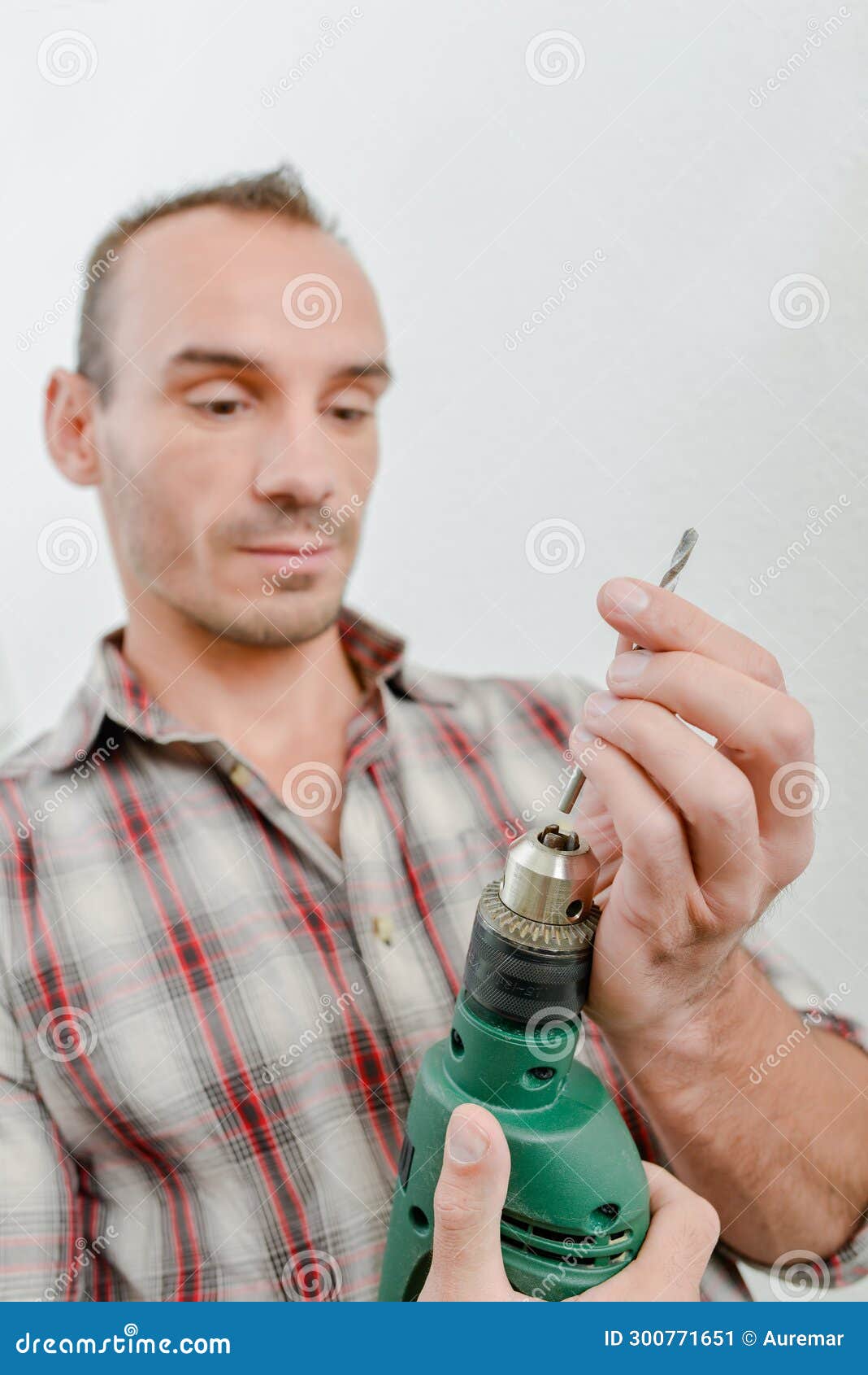 Male worker with drill stock image. Image of electric - 300771651