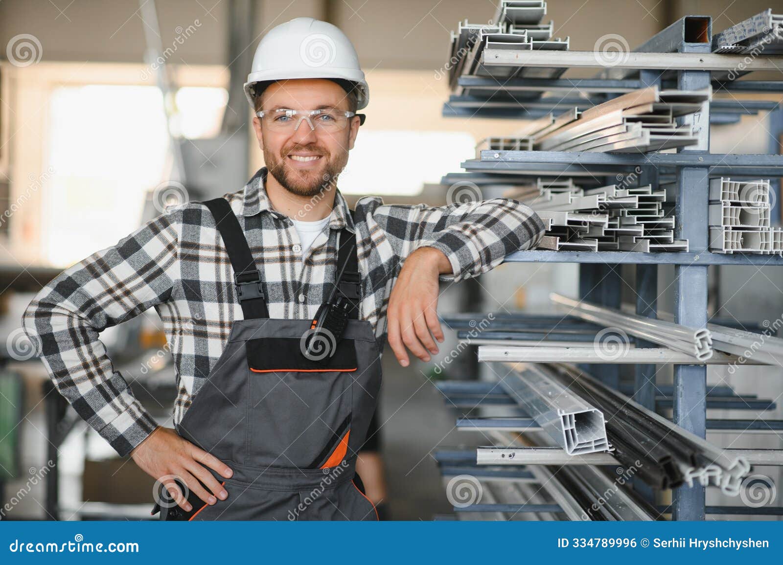 Male worker at a factory stock photo. Image of manufacture - 334789996
