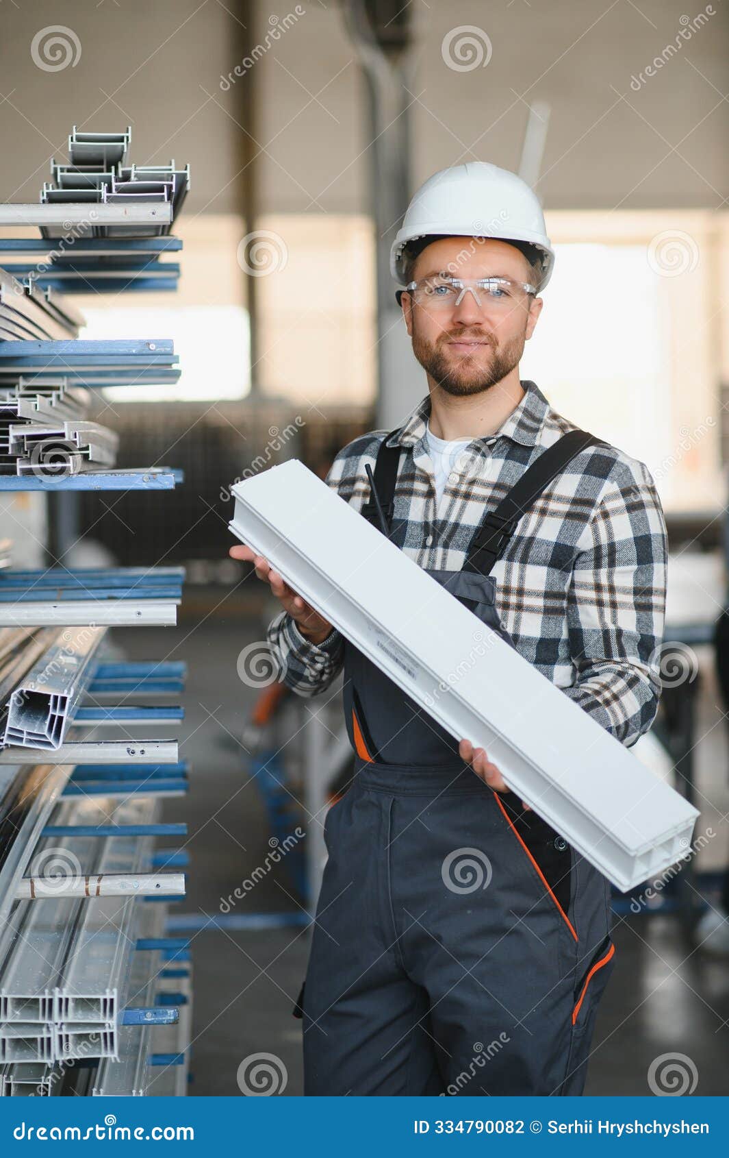 Male worker at a factory stock photo. Image of manufacture - 334790082