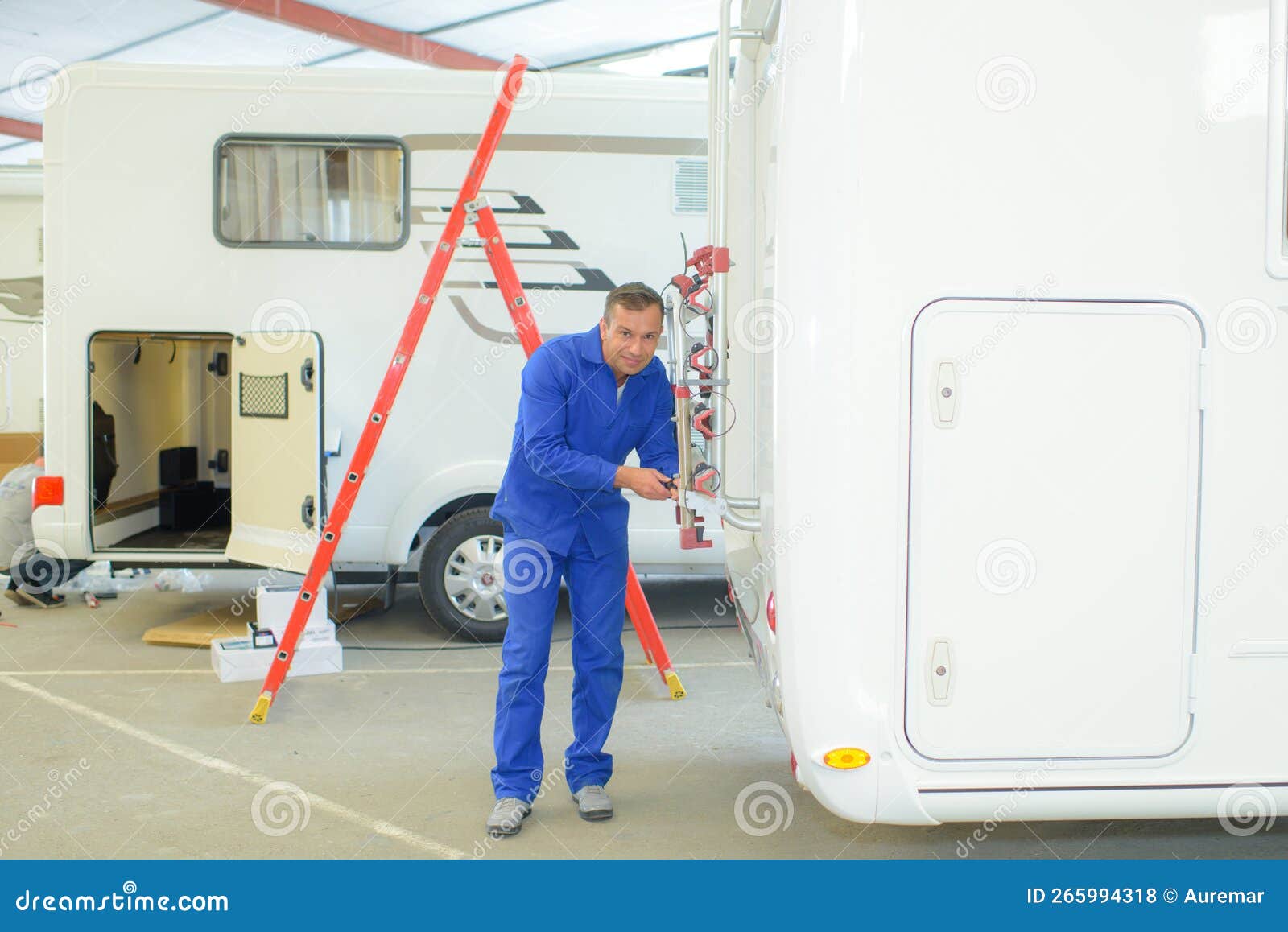 Male worker fixing caravan stock photo. Image of single - 265994318