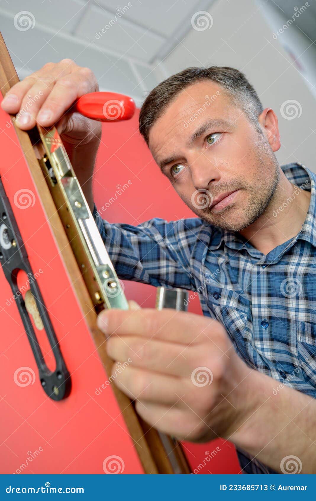 Male Worker Fixing Door Lock Stock Image - Image of renovate, home ...