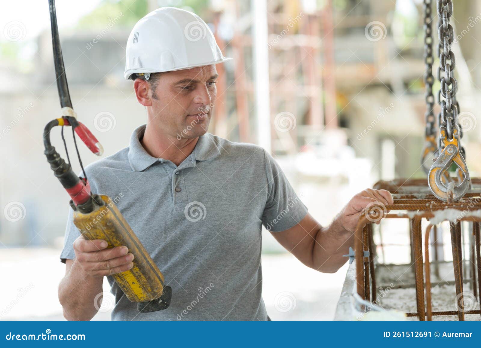 Male worker fixing hook stock image. Image of hardhat - 261512691