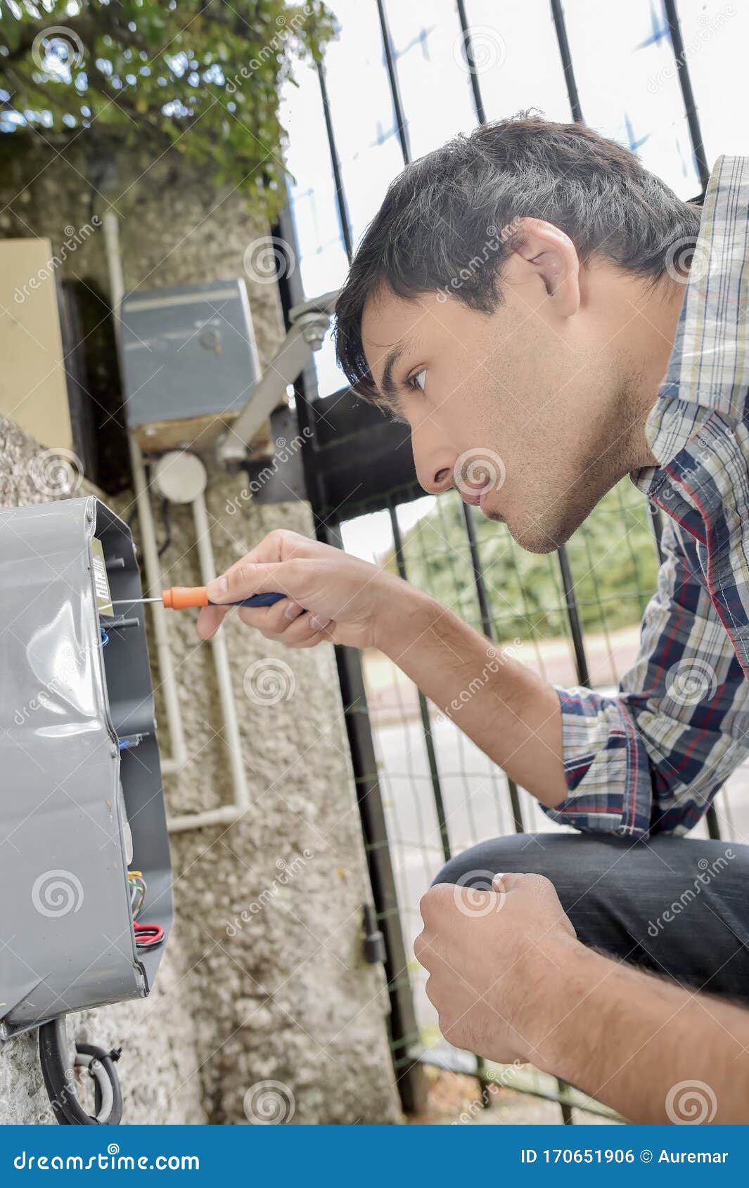 Male worker fixing meter stock photo. Image of repairing - 170651906