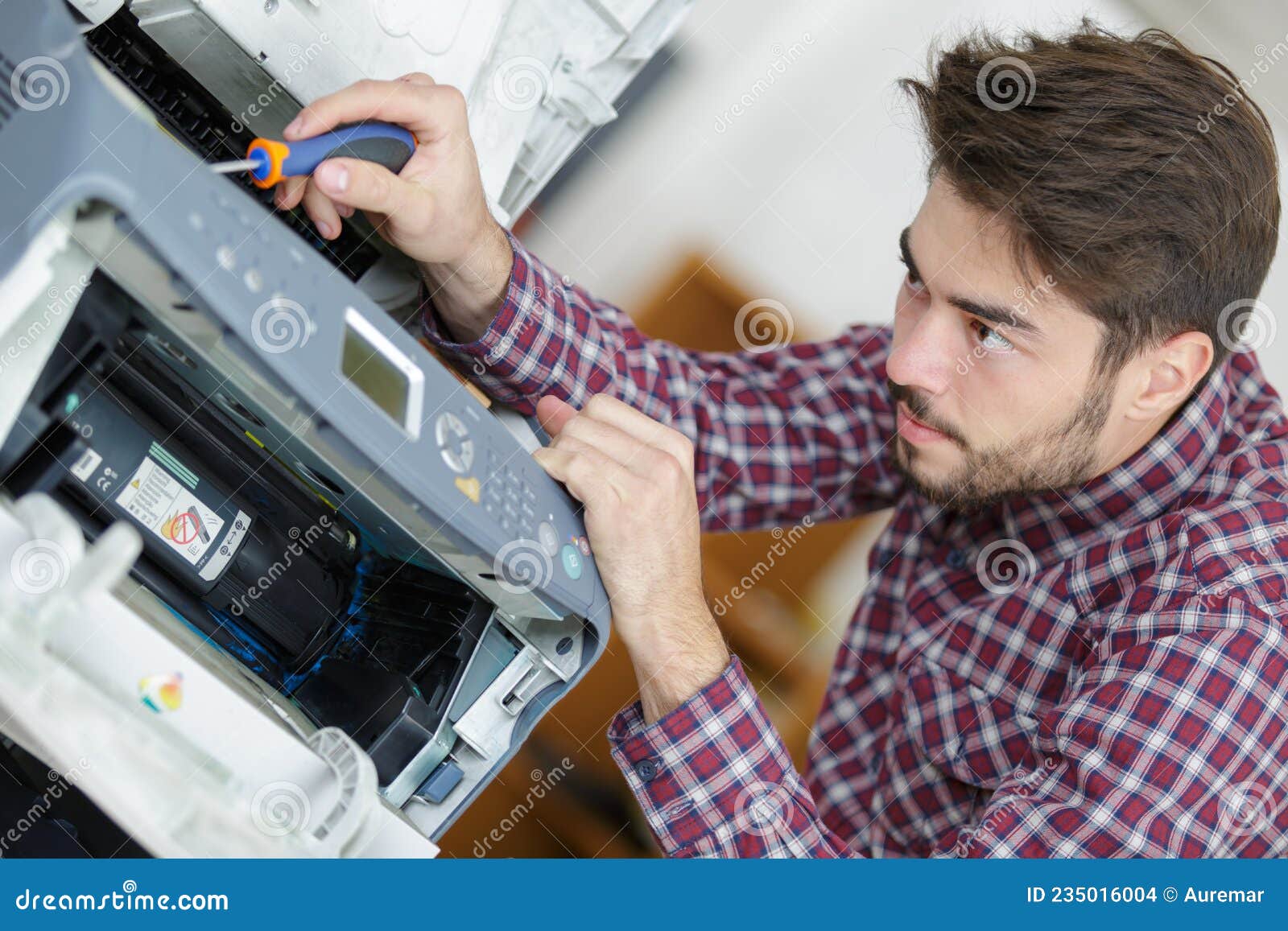 Male worker fixing printer stock photo. Image of printer - 235016004