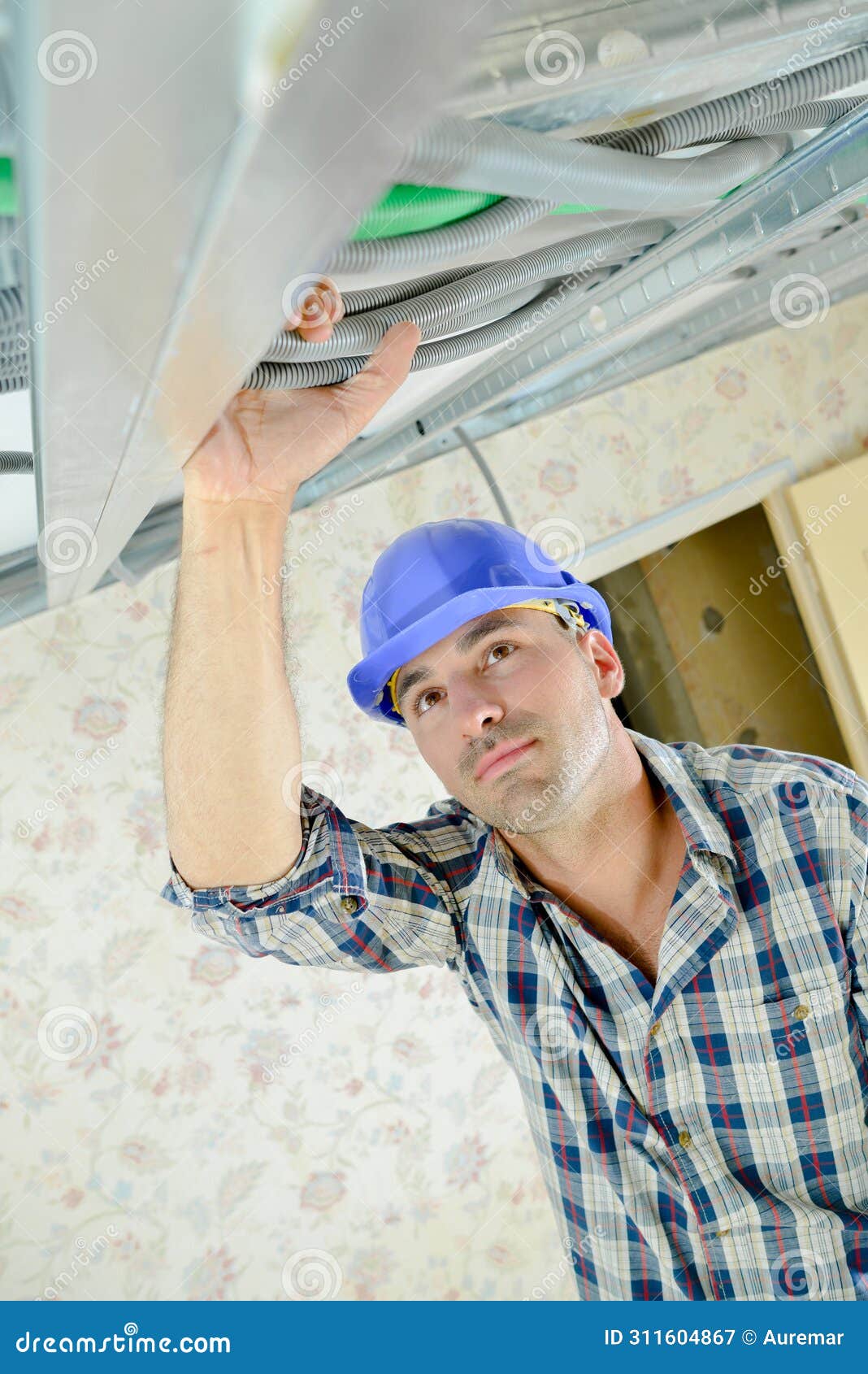 Male Worker Inspecting Ceiling Stock Image - Image of metal, curves ...