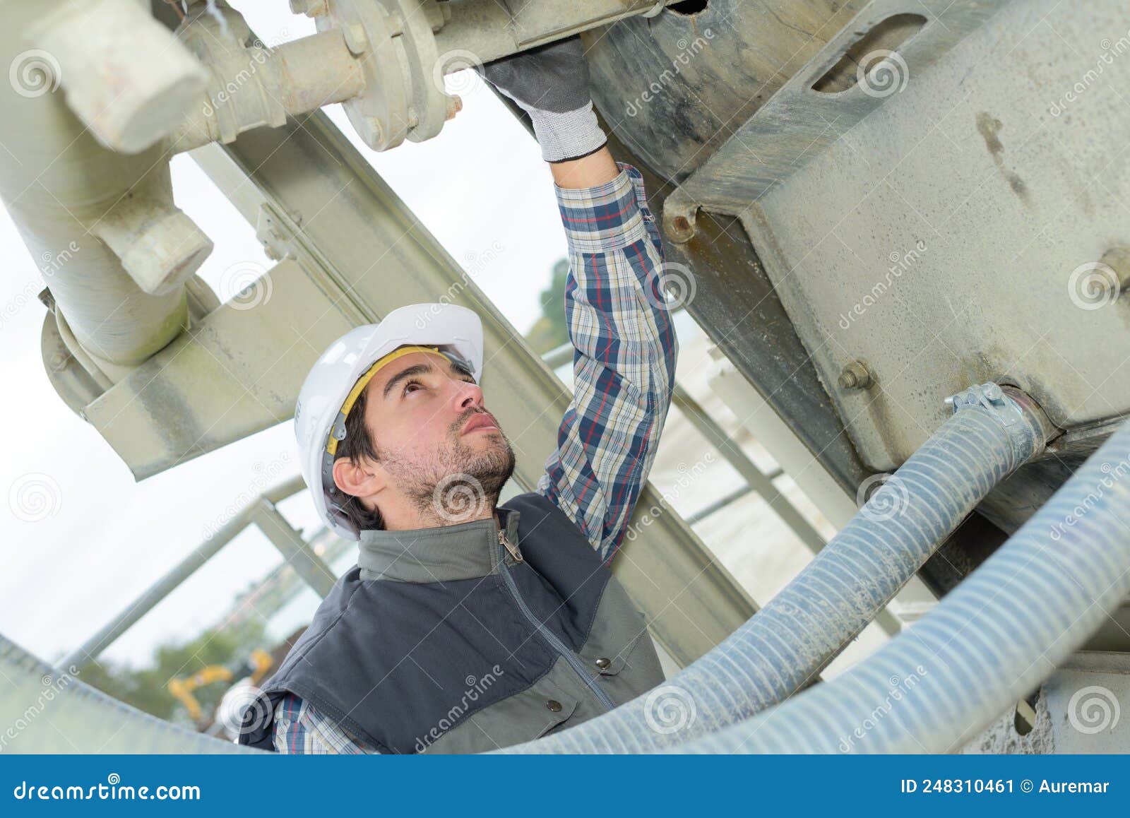 Male Worker Inspecting Machine Stock Image - Image of department ...