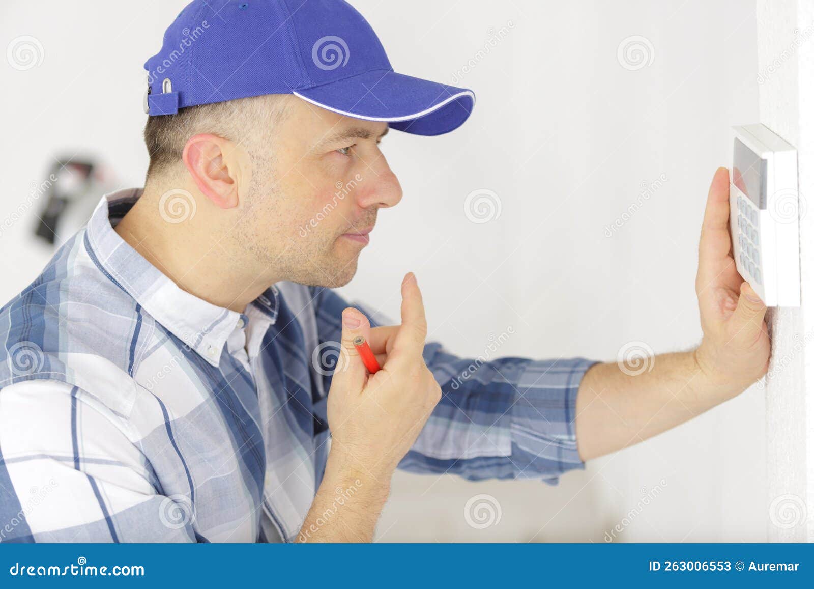 Male Worker Installing Alarm System Stock Image - Image of intercom ...
