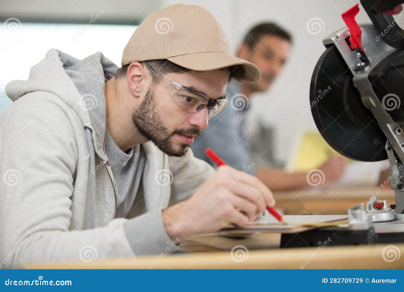 Male Worker Making Position To Cut with Circular Saw Stock Image ...