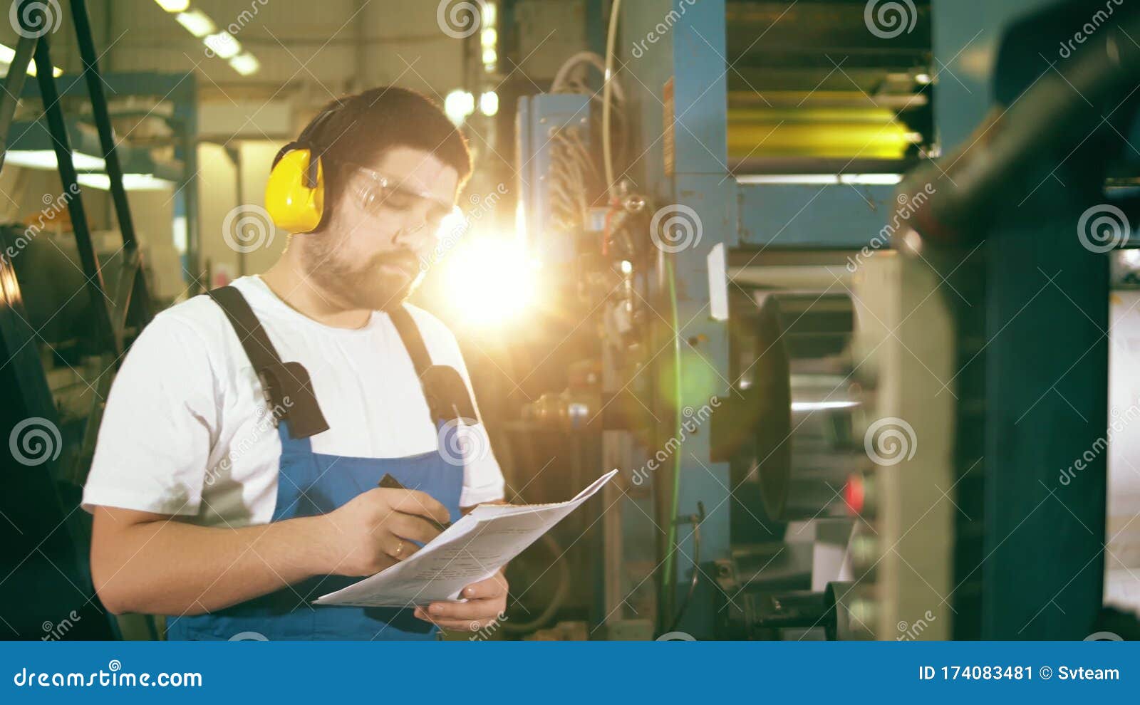 Male Worker is Observing the Working Process in a Typography Unit Stock ...