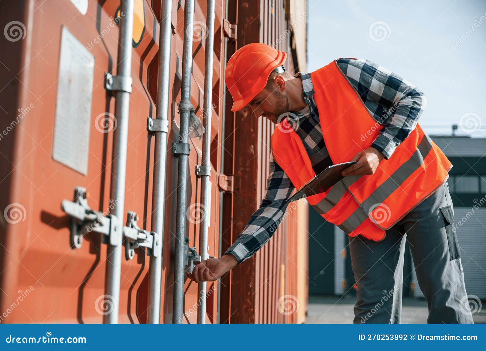 Male Worker is Opening a Container Stock Photo - Image of lighting ...