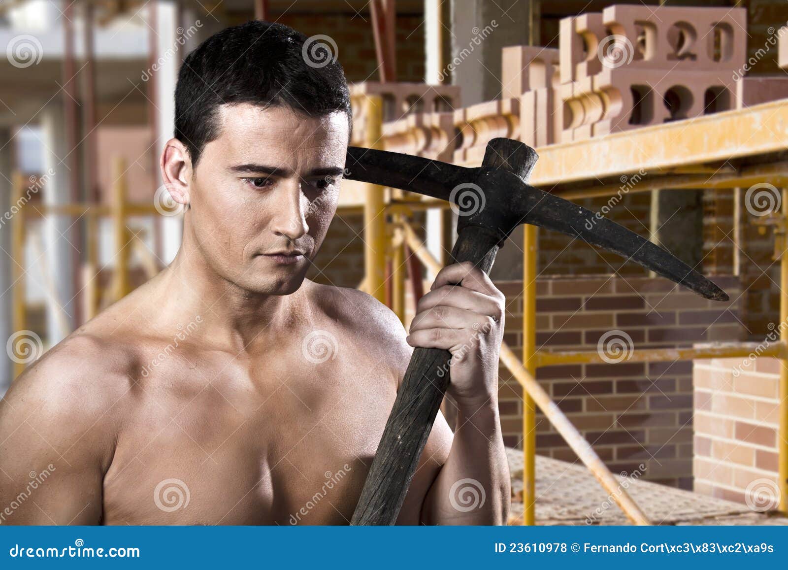 Male Worker with Pick Axe and Bricks Stock Photo - Image of brick ...