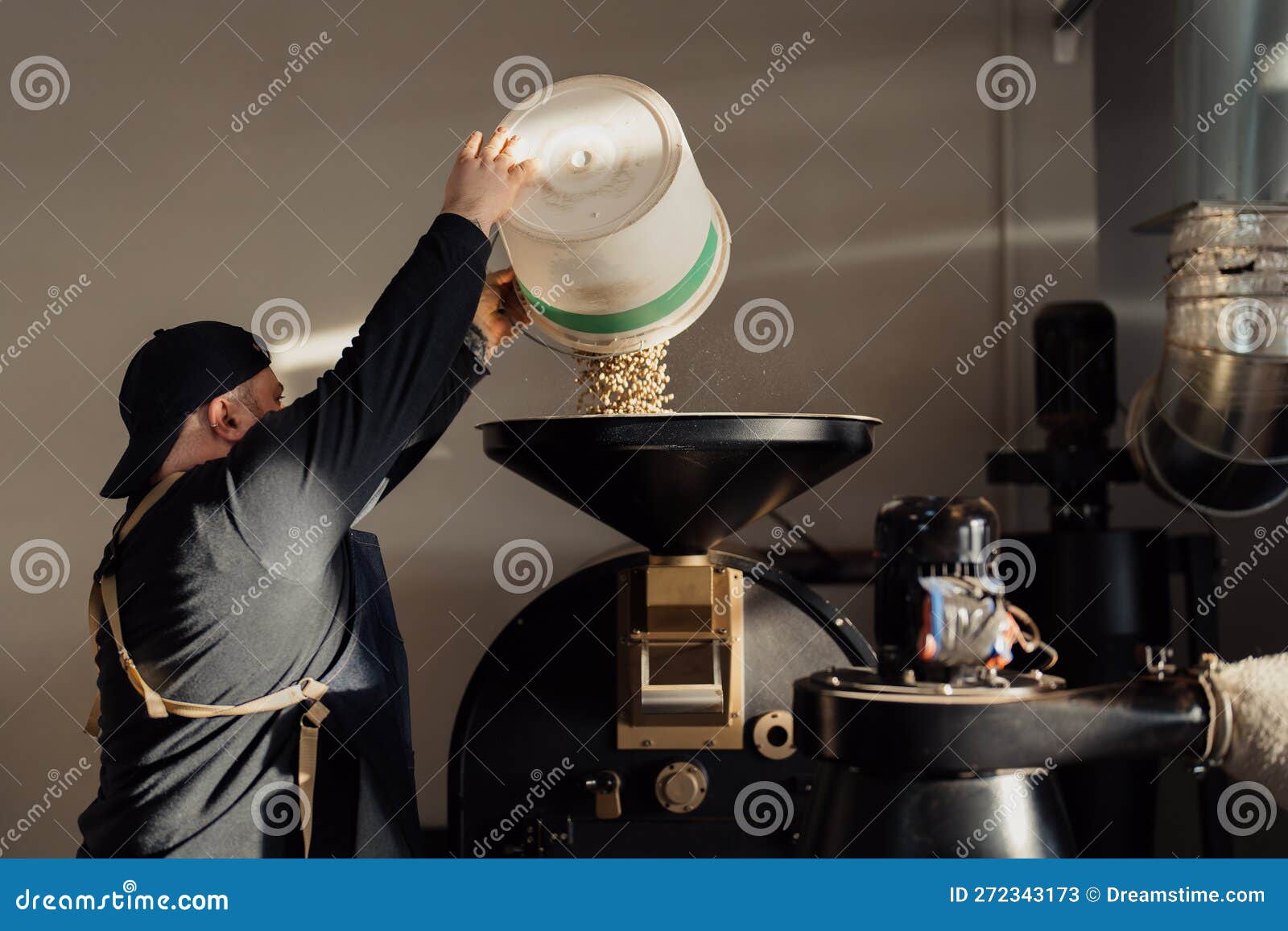 Male Worker Pouring Coffee Beans into Roasting Machine Stock Image ...