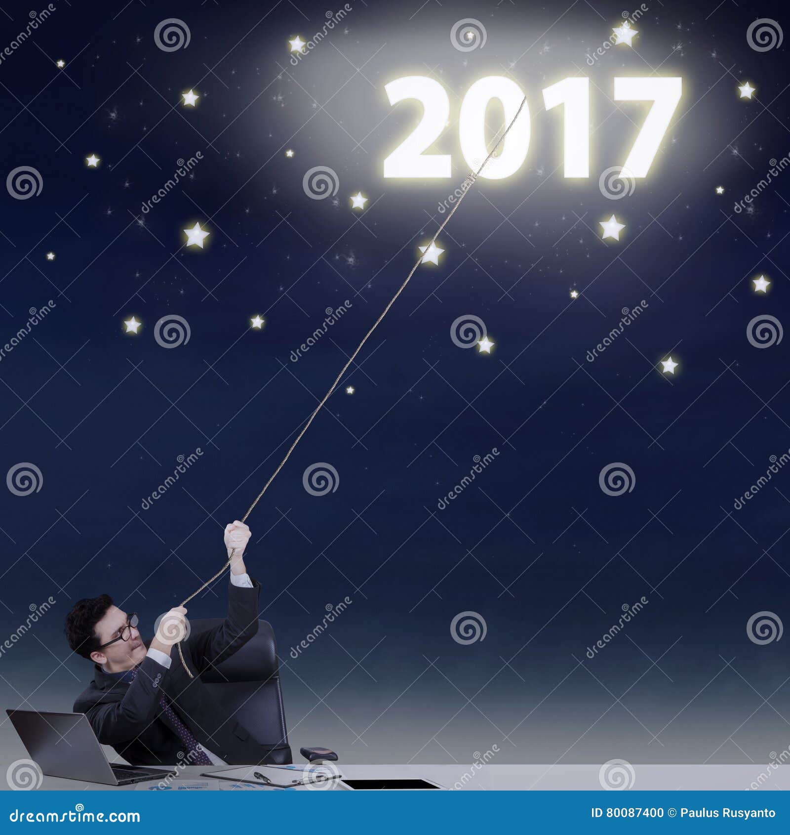 Male Worker Pulling Number 2017 at the Sky Stock Photo - Image of ...