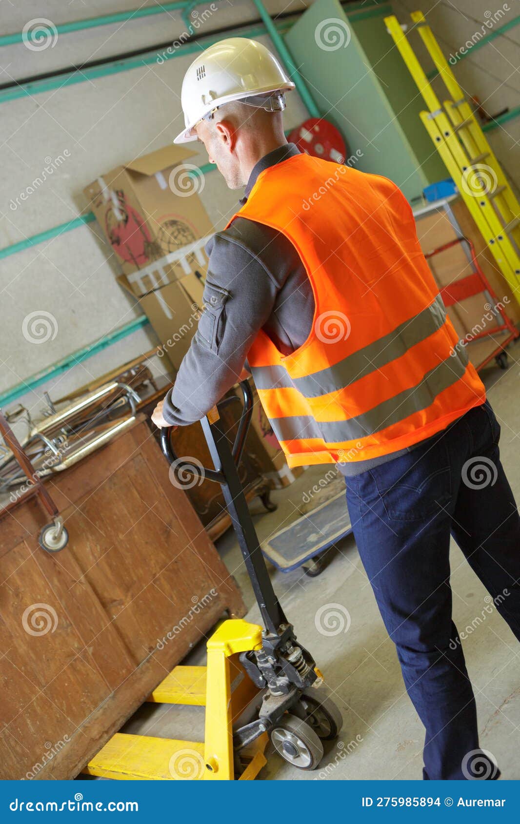Male Worker Pulling Trolley Stock Photo - Image of pulling, industry ...