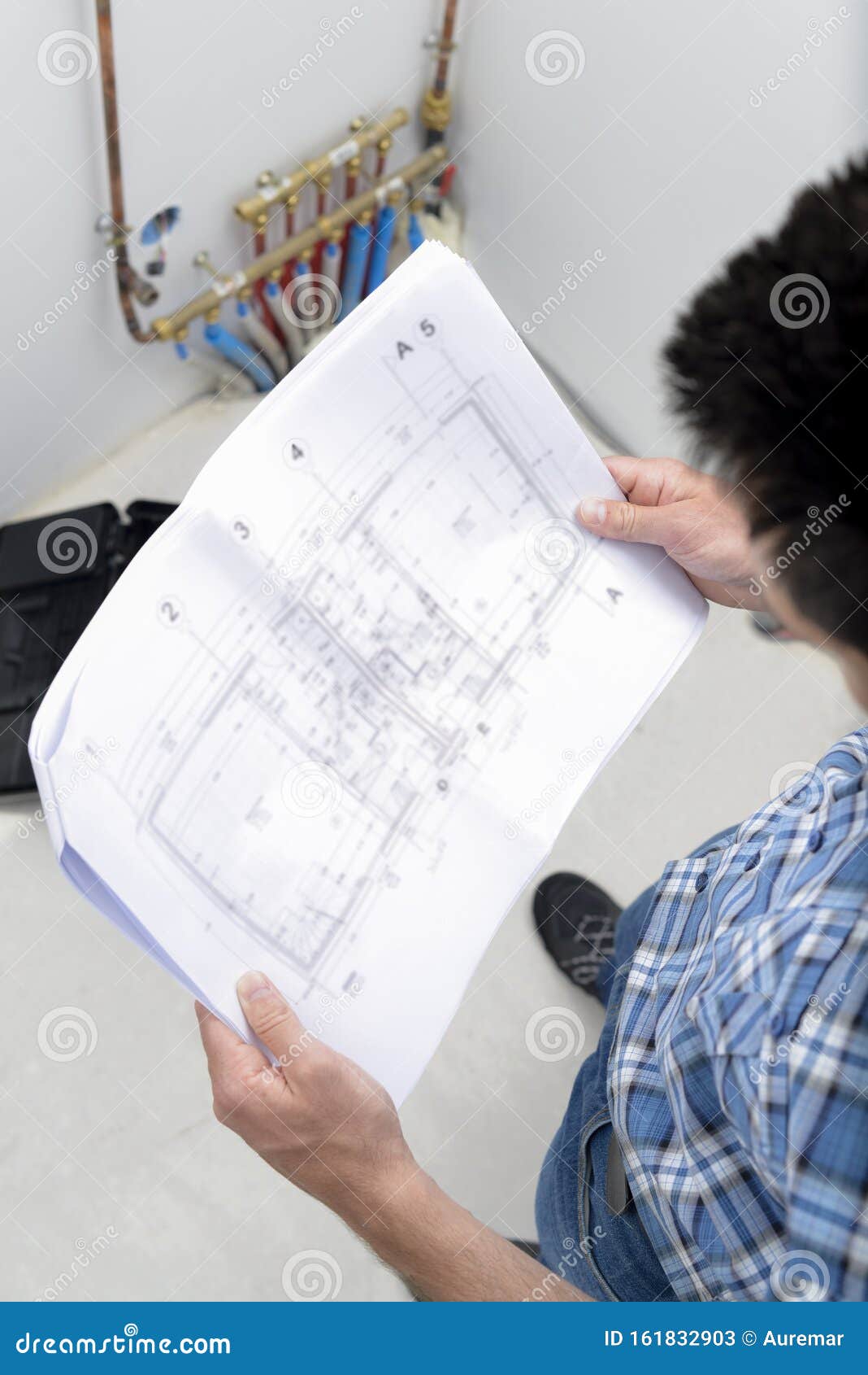Male Worker Reading Blueprint Stock Image - Image of survey ...