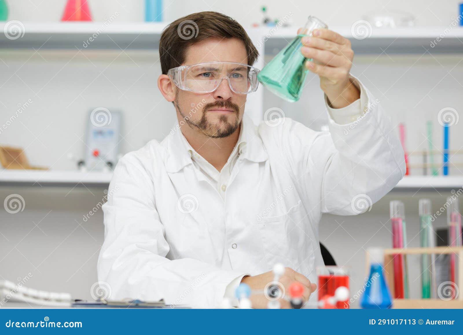Reseacher Holding Multi Channel Pipette Withdrawing Yellow Compound ...