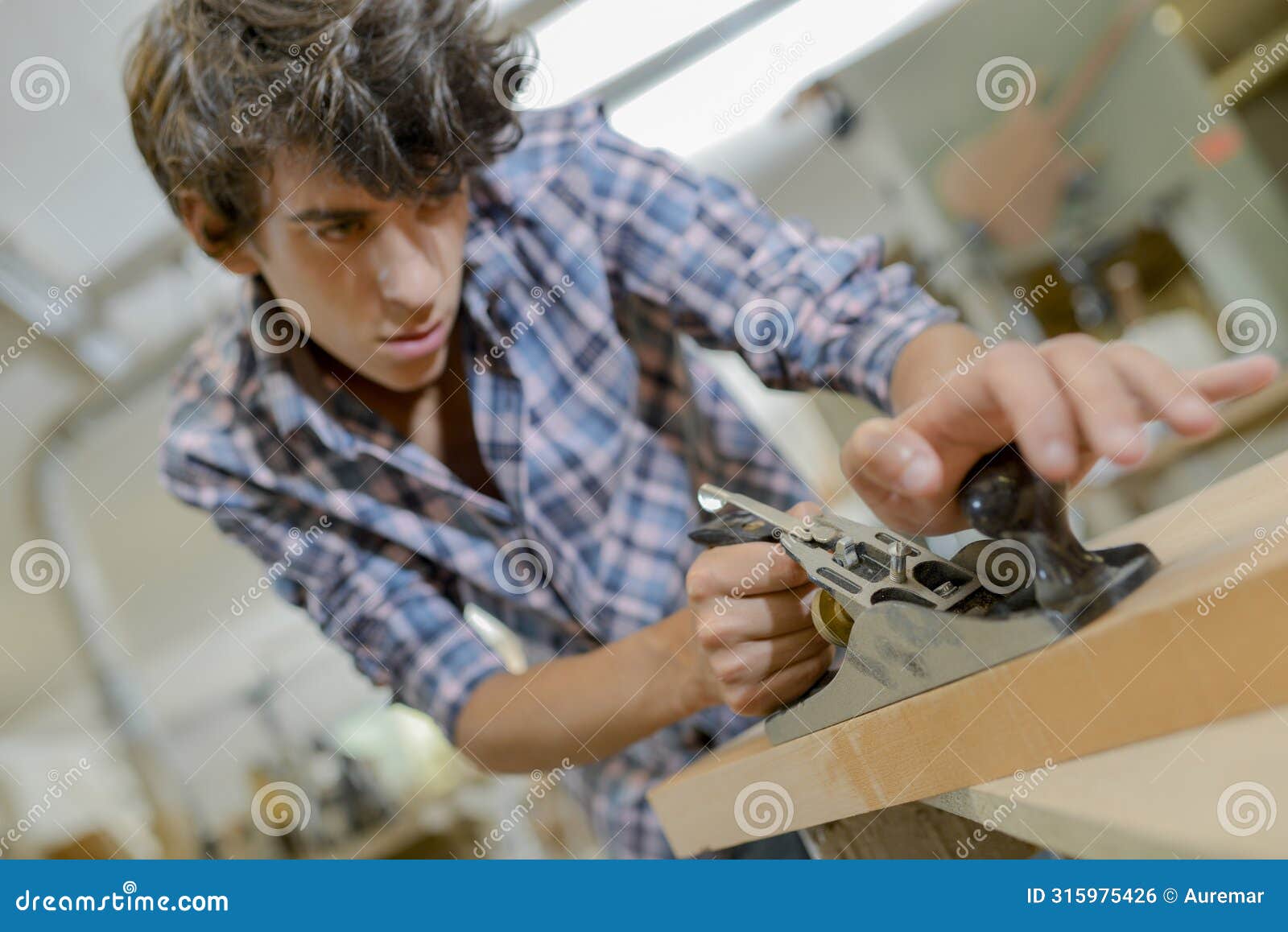 Male Worker Scraping Surface Stock Photo - Image of cabinetry ...