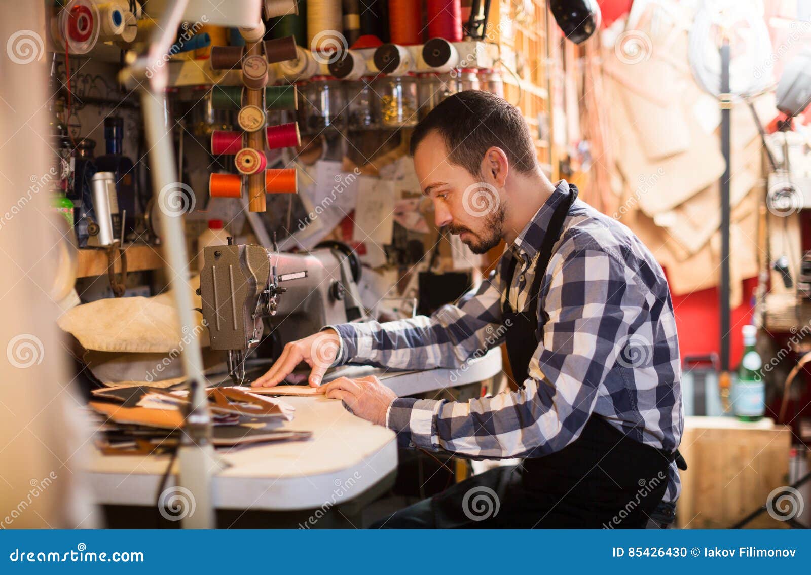 Male Worker Stitching New Belt Stock Photo - Image of attentive, item ...