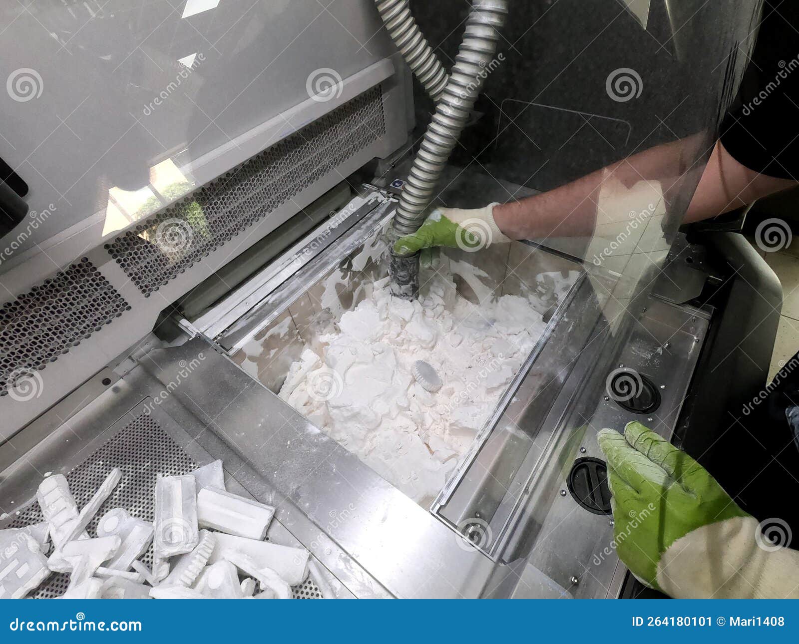 Worker Taking Out Models of White Polyamide Powder and Cleaning Them ...