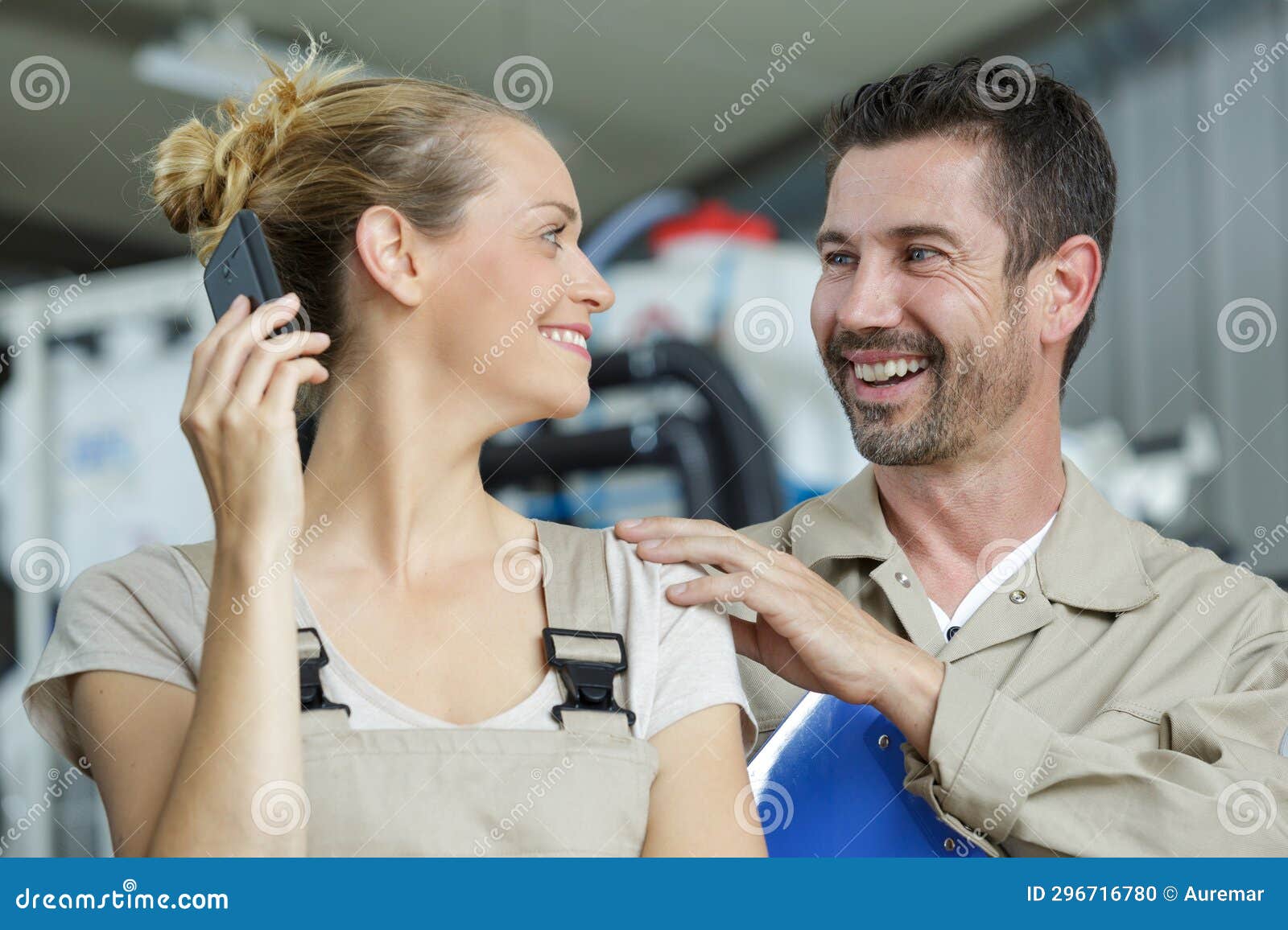 Male Worker Tapping Female Colleague on Shoulder Stock Photo - Image of ...