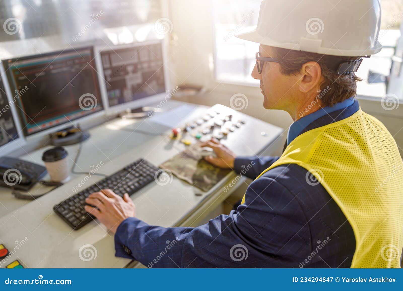 Male Worker Using Computers at Manufacturing Plant Stock Image - Image ...
