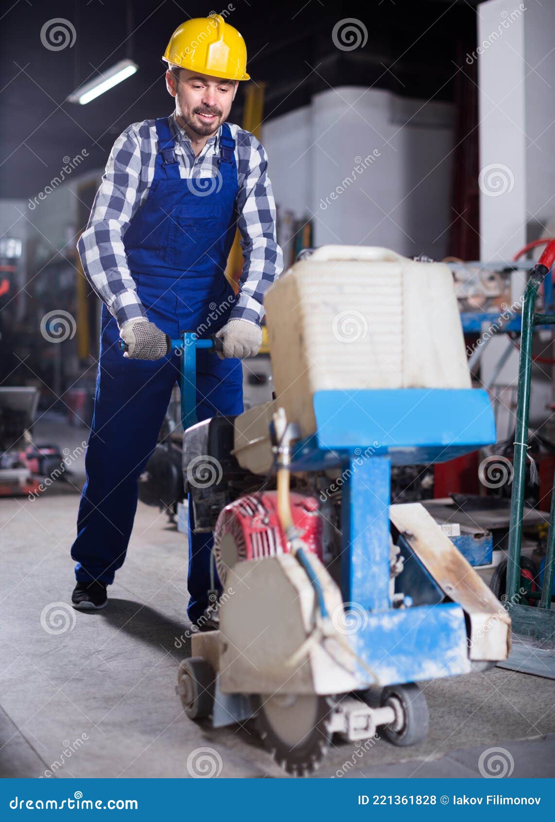 Male Worker is Using Gas Saw for Construction Work Stock Photo - Image ...