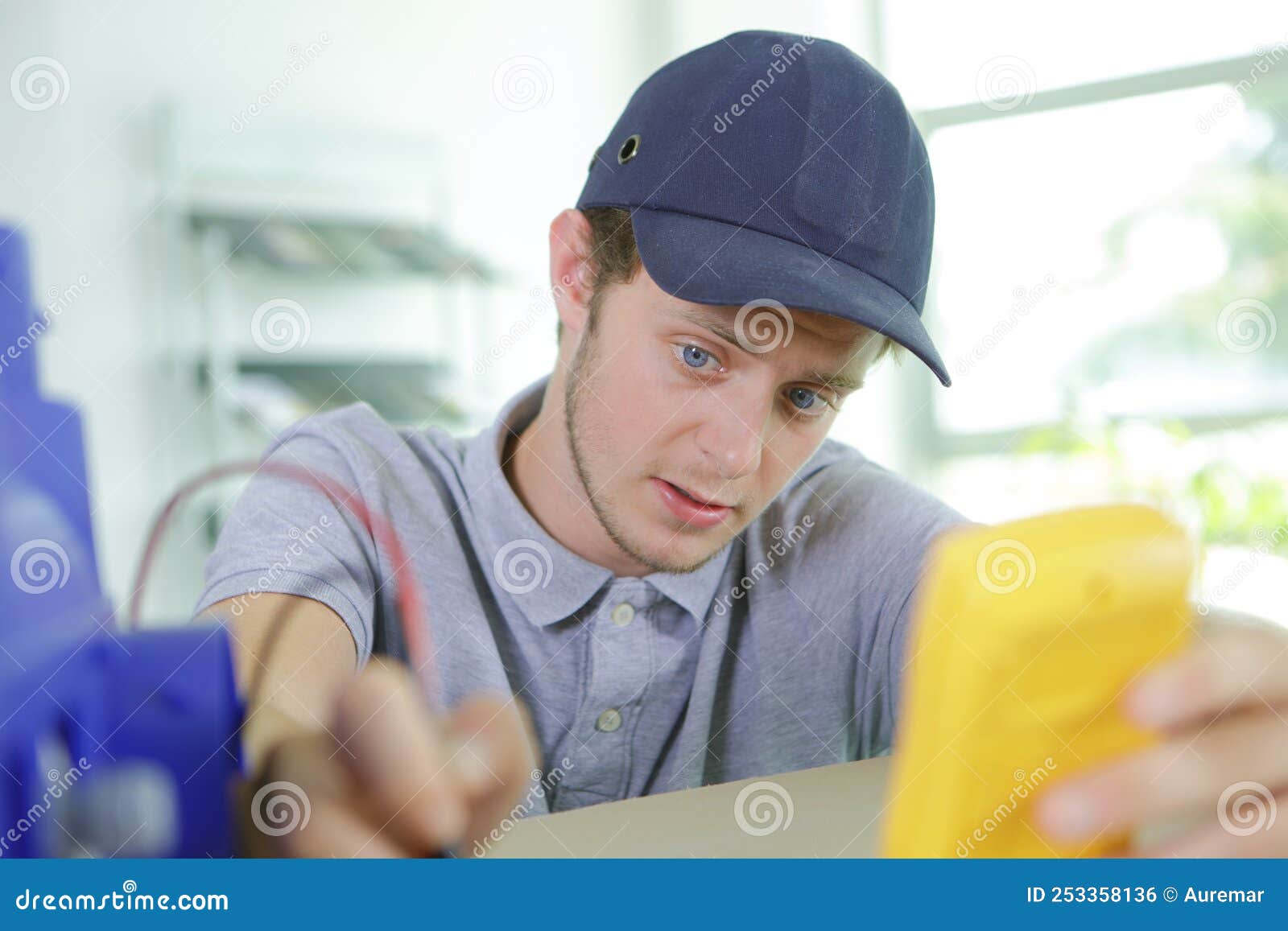 Male Worker Using Multimeter Stock Photo - Image of view, professional ...