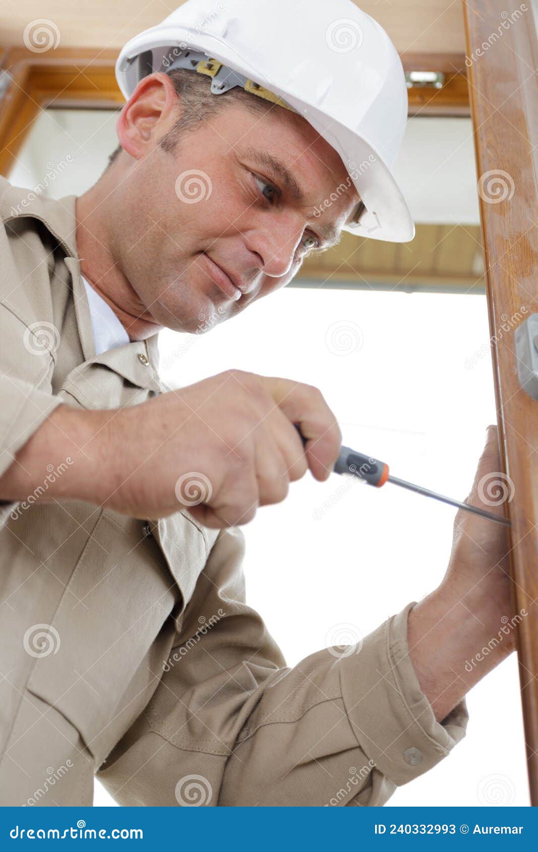 Male Worker Using Screwdriver while Fitting Door Stock Image - Image of ...