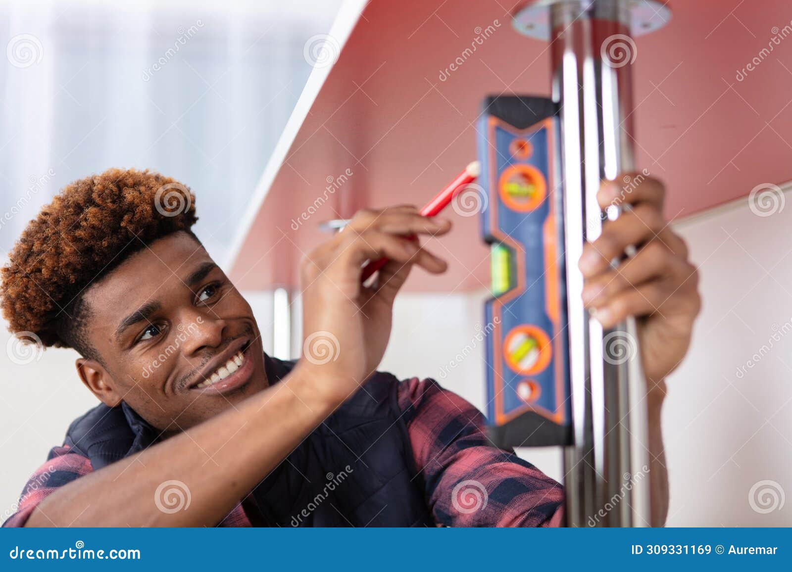 Male Worker Using Spirit Level Stock Image - Image of afrohair ...