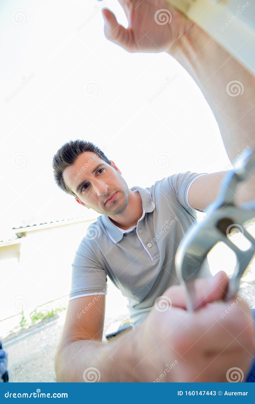 Male worker using tool stock image. Image of hold, conceptual - 160147443