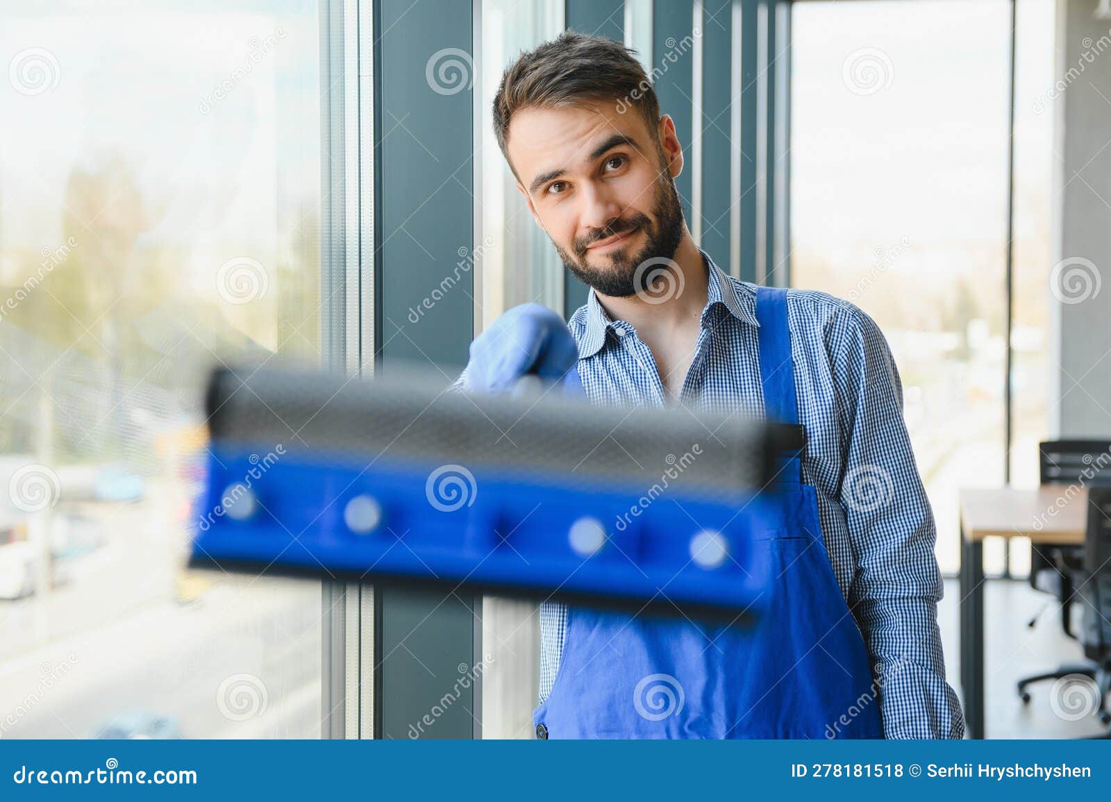 Male Worker Washing Window Glass. Stock Photo - Image of office ...