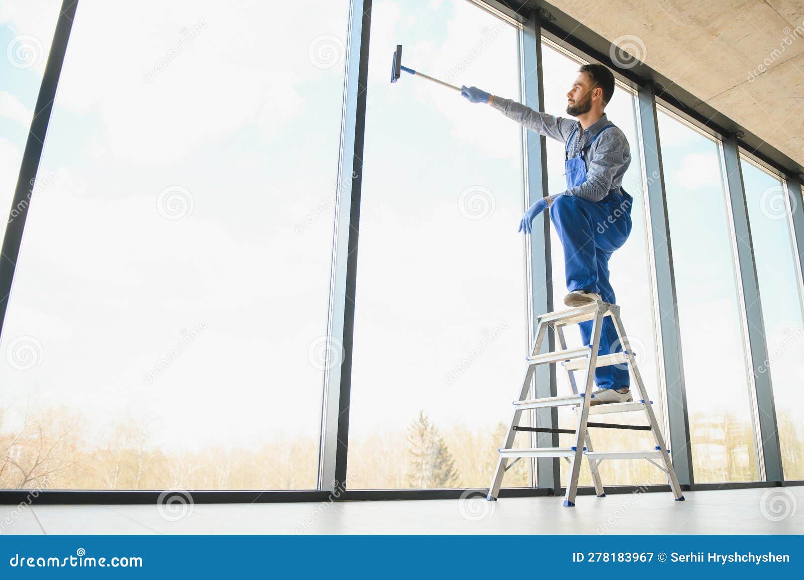 Male Worker Washing Window Glass. Stock Image - Image of background ...