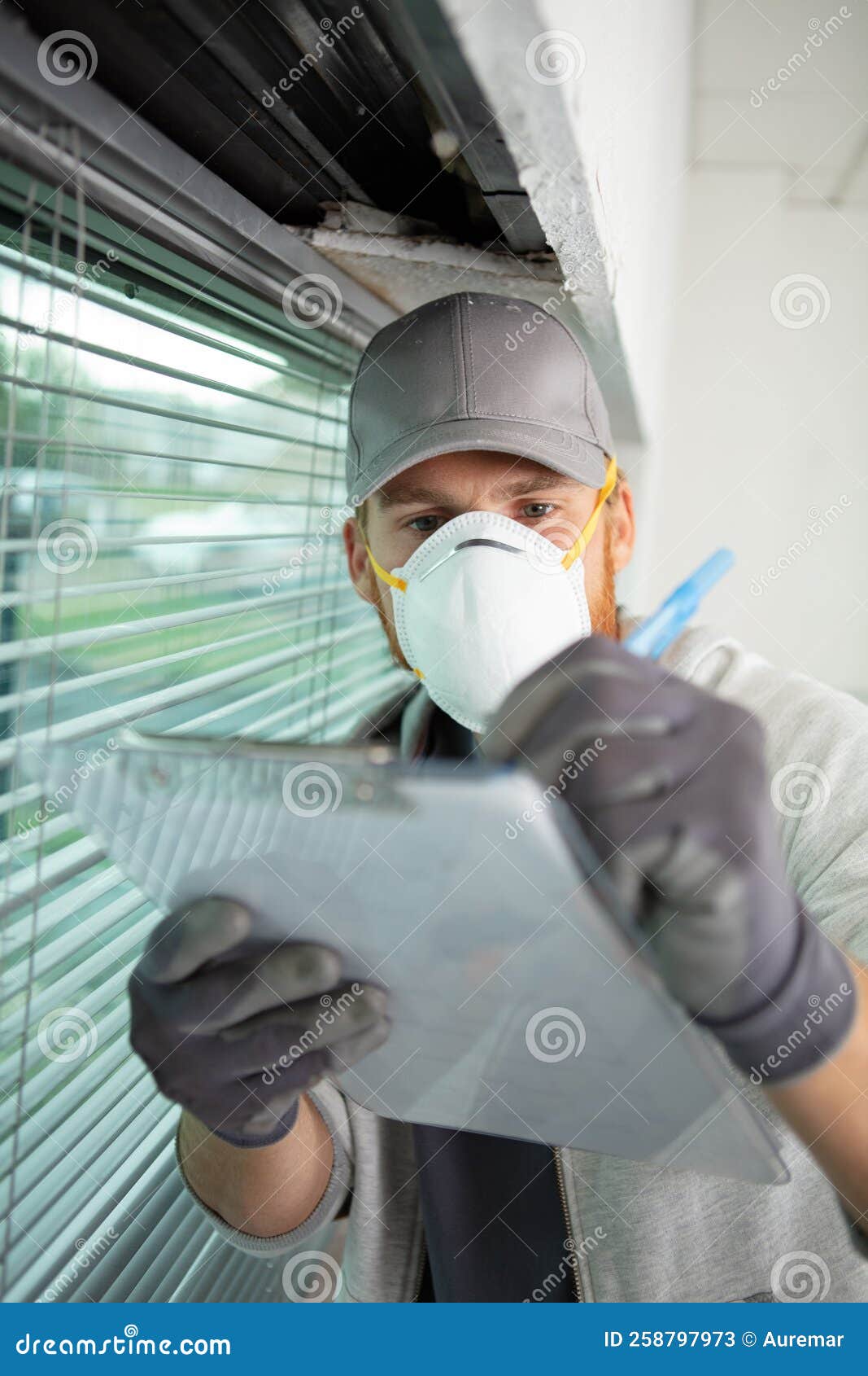 Male Worker Wearing Mask Writing Notes Stock Image - Image of ...