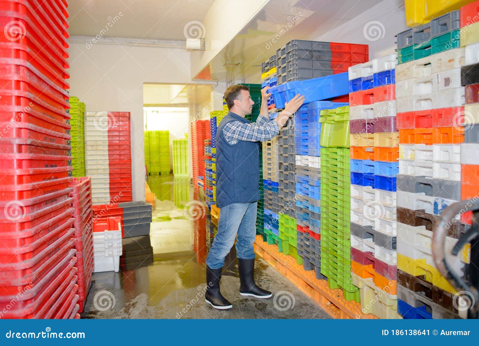 Male Worker Working with Plastic Crates Stock Image - Image of ...