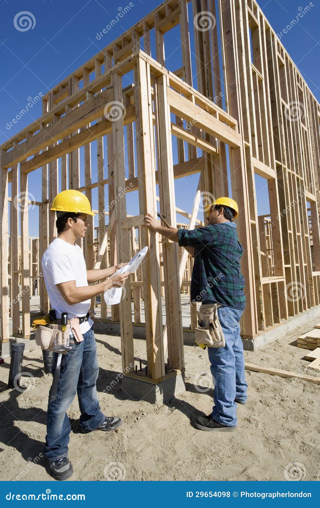 Male Workers Working at Construction Site Stock Photo - Image of ...