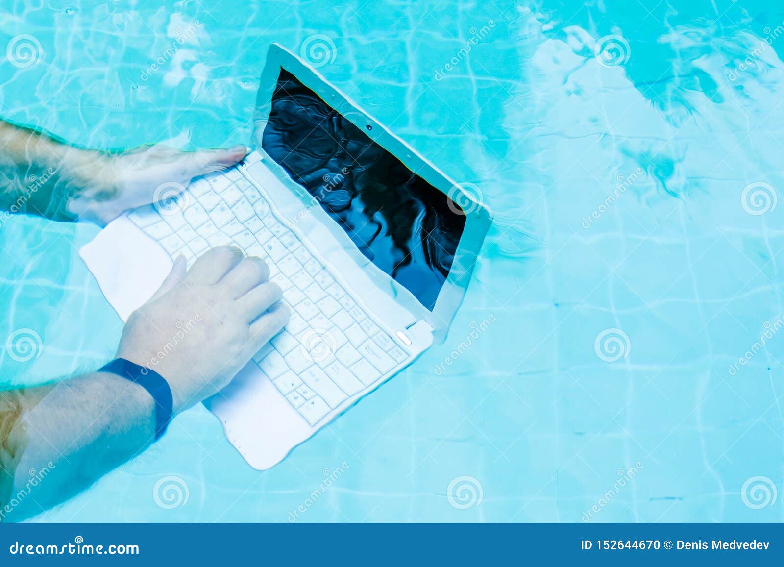 Male Works on Minicomputer Under Water. Minicomputer at the Bottom of ...