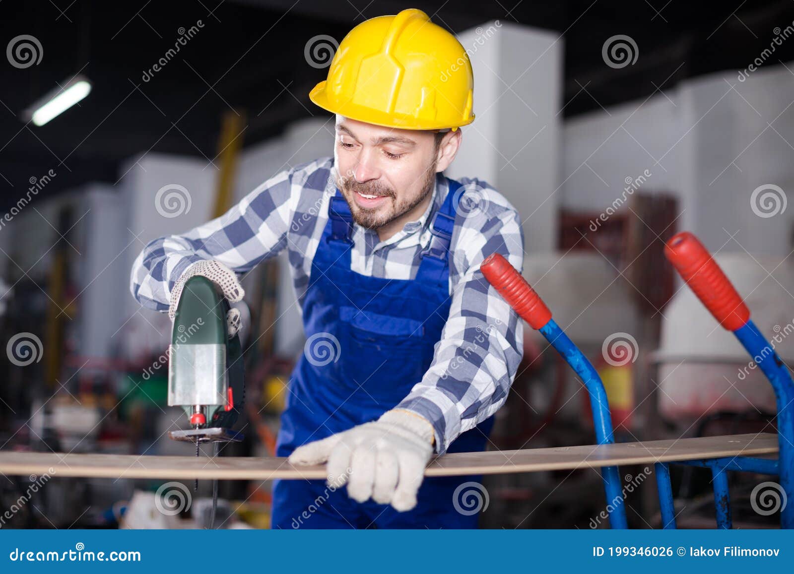 Male 29-39 Years Old is Using Power Jigsaw for Construction Work Stock ...